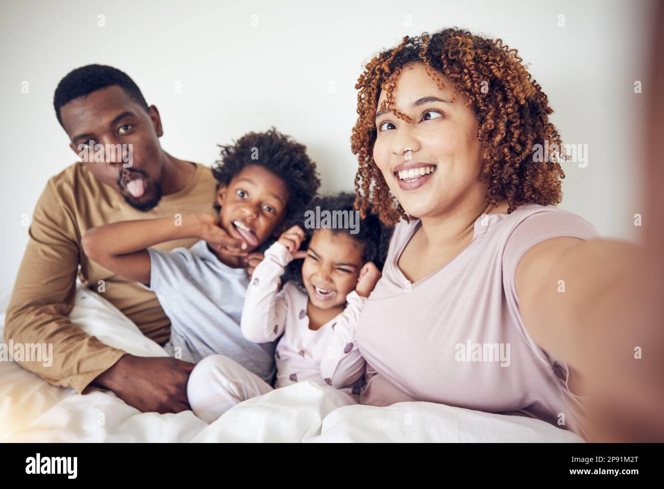 Black family, selfie and funny face portrait in home bedroom, smile and ...
