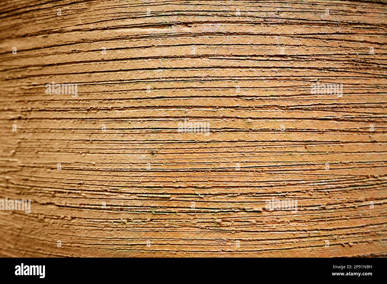 Ceramic pot surface close-up background. Red clay lines rough textured ...