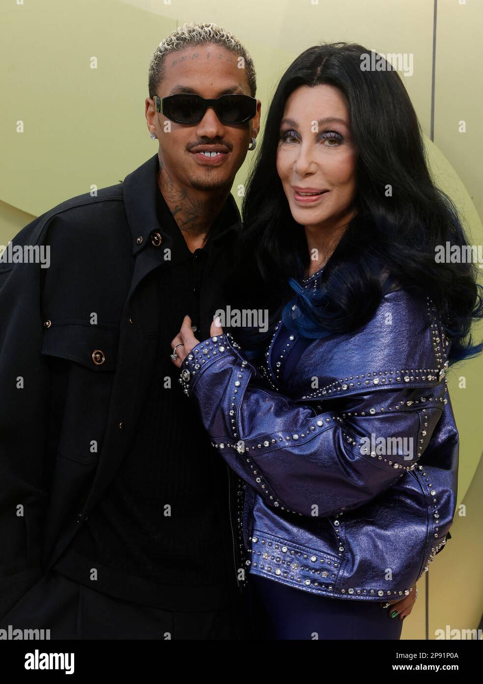 Alexander Edwards and Cher attend at the Versace FW23 Show held at the ...