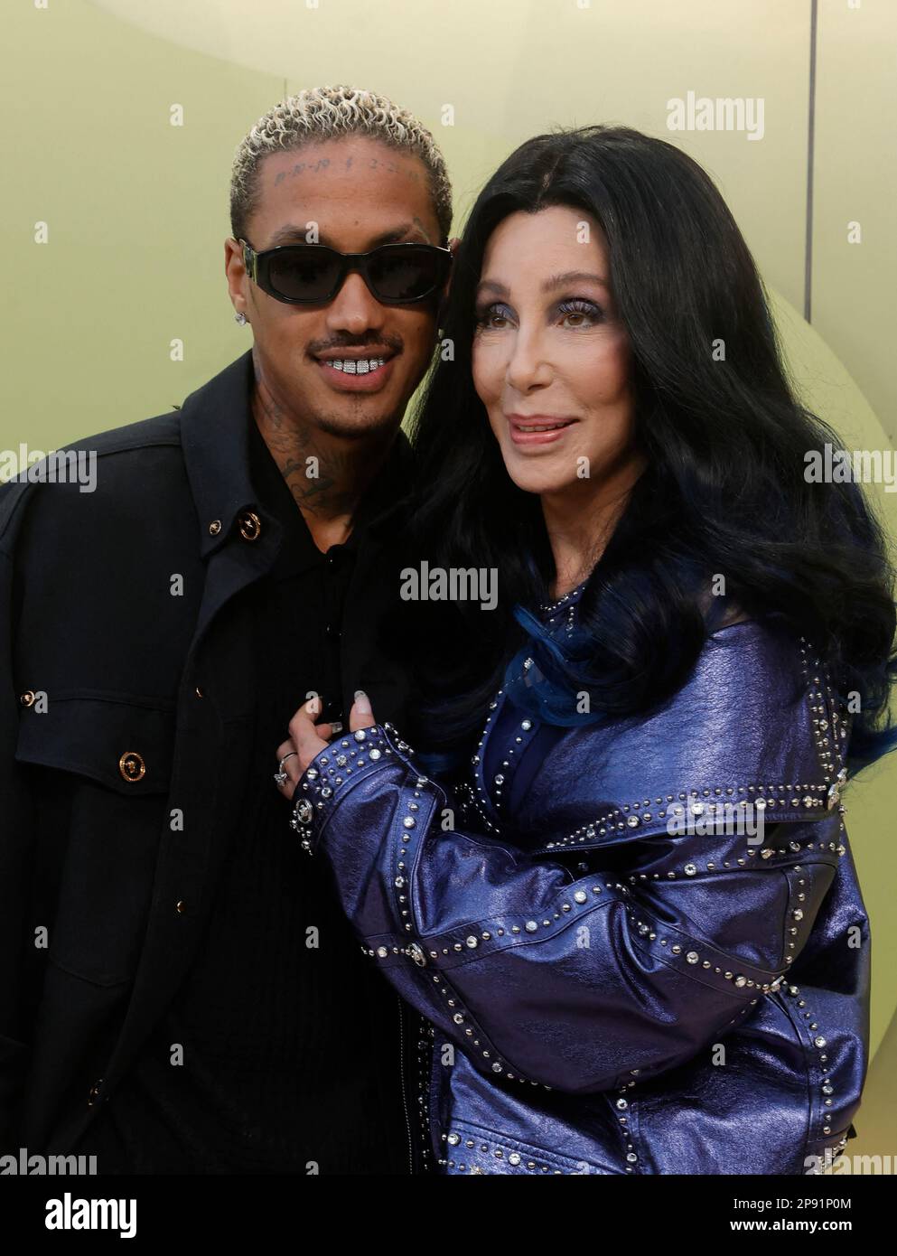 Alexander Edwards and Cher attend at the Versace FW23 Show held at the ...