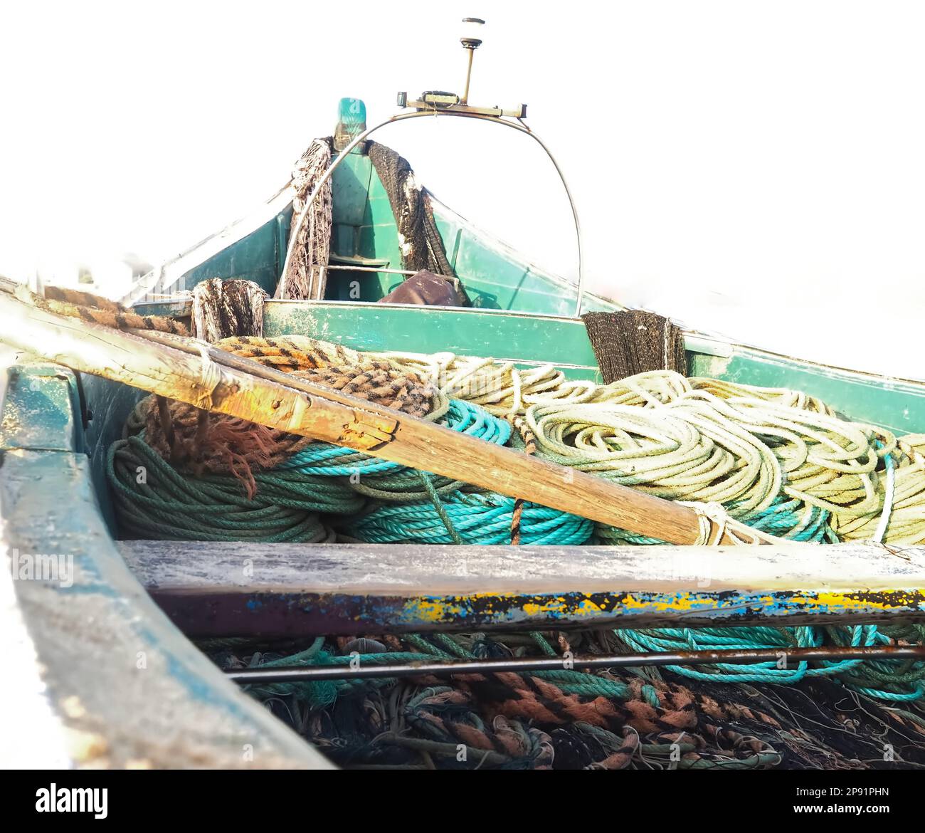 Fisher boat with nets and ropes on a beach Stock Photo - Alamy