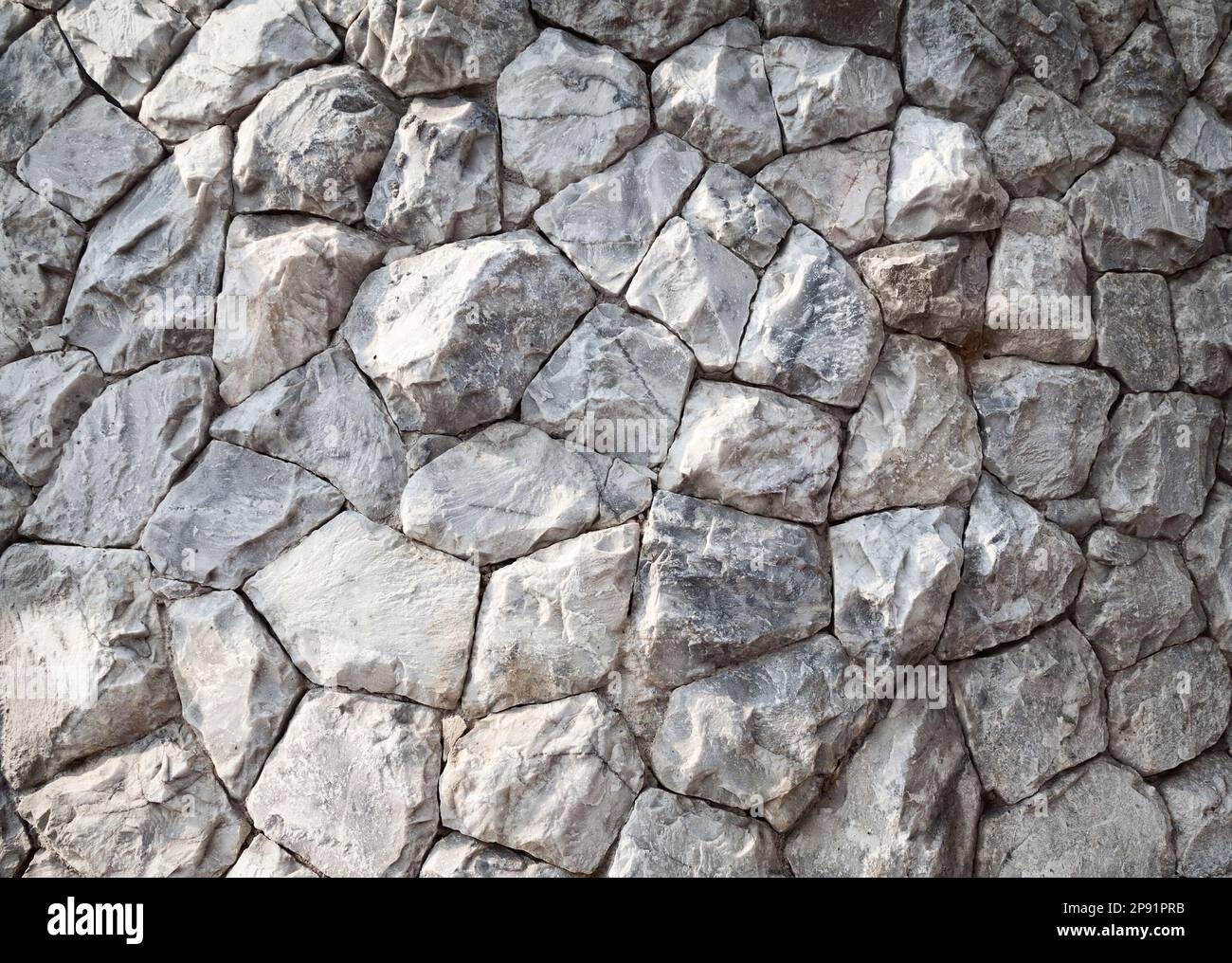 White rocks wall pattern textured background. Wall made of rough marble ...