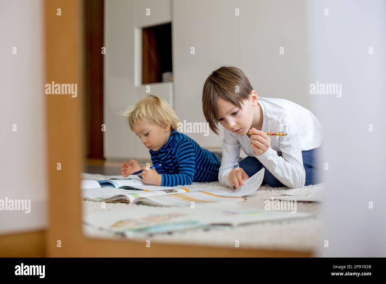 Child exploring notebook hi-res stock photography and images - Alamy