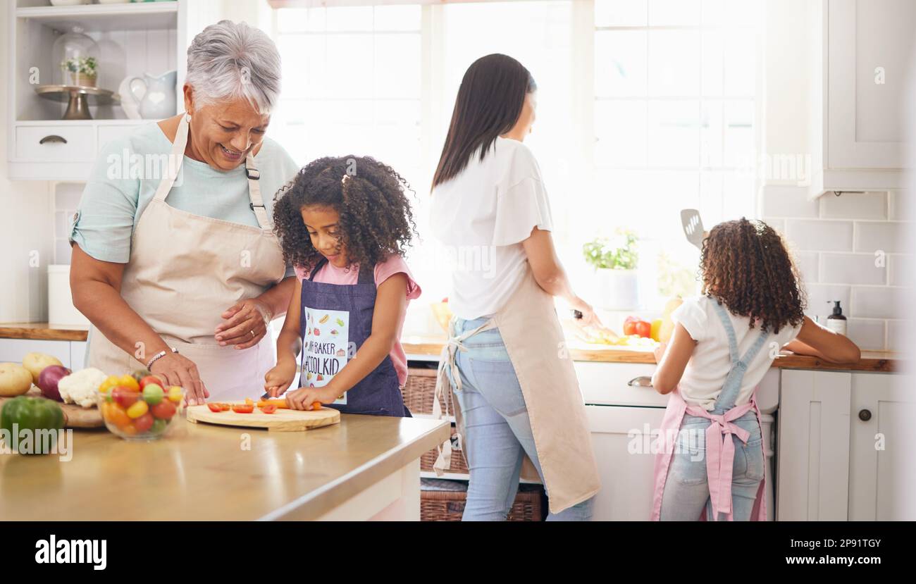 Black family cooking, children learning and grandmother teaching girl ...