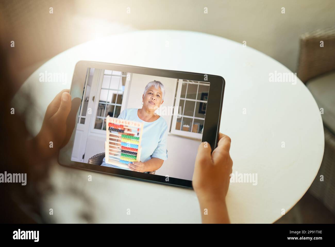 Elearning, video call and teacher on tablet screen teaching math with ...