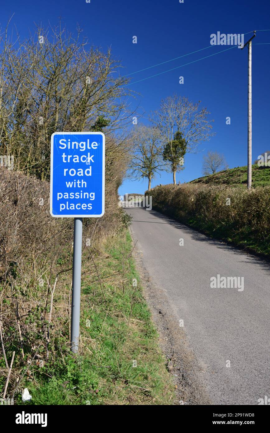 A sign beside a single track road in the UK Stock Photo - Alamy