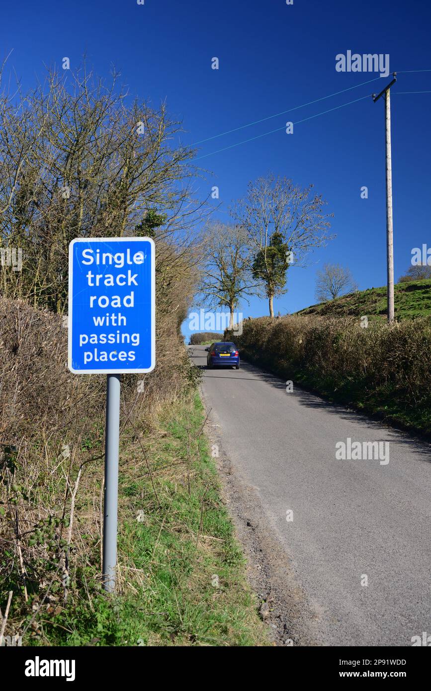 A sign beside a single track road in the UK Stock Photo - Alamy