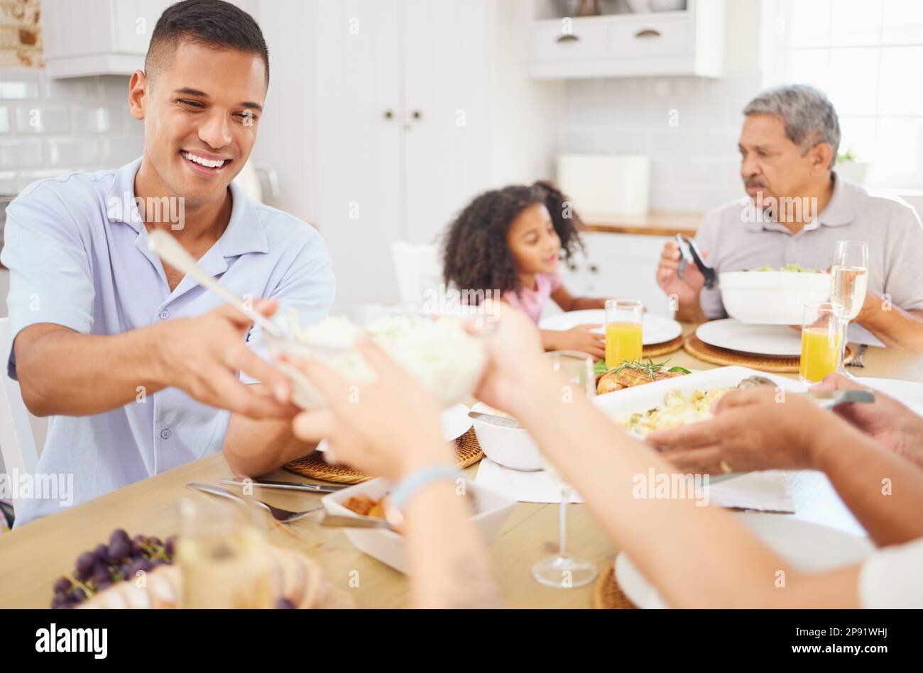 Happy family, food and dinner eating on dining room table for ...