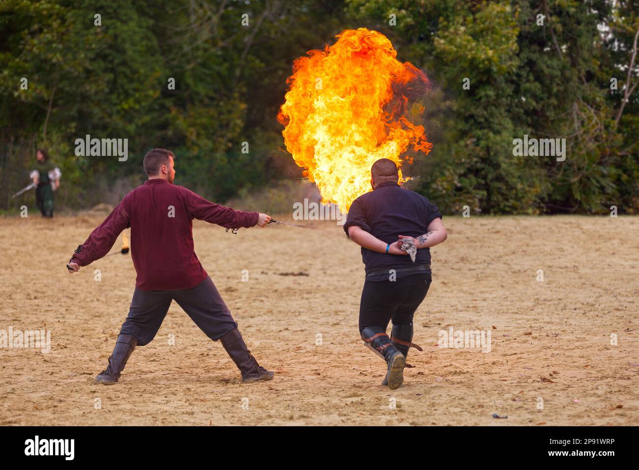 Luzarches, France - October 12 2019: A medieval fire-eater breathing ...