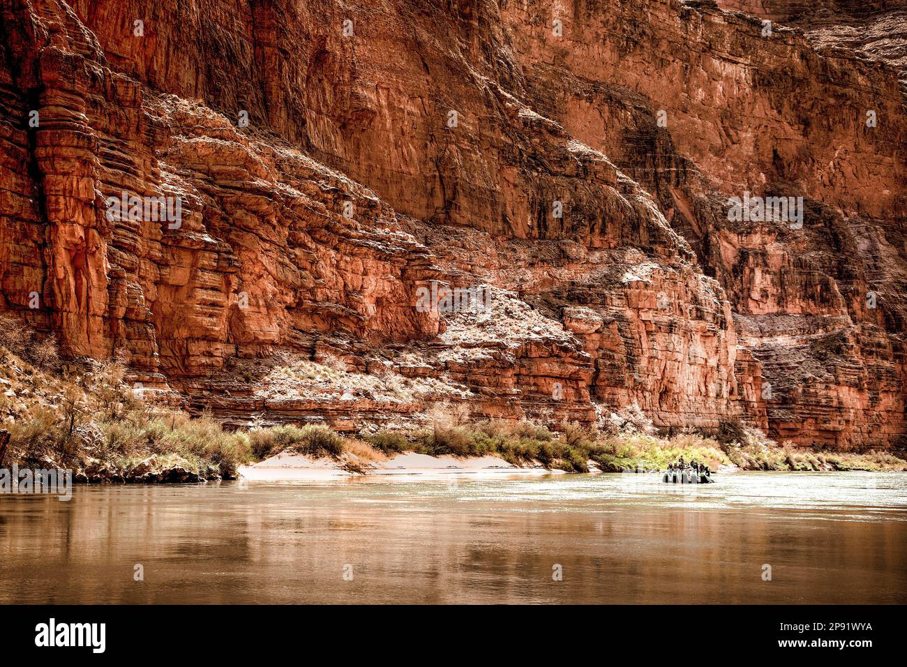 A large raft is insignificant next to the steep walls of the upper ...