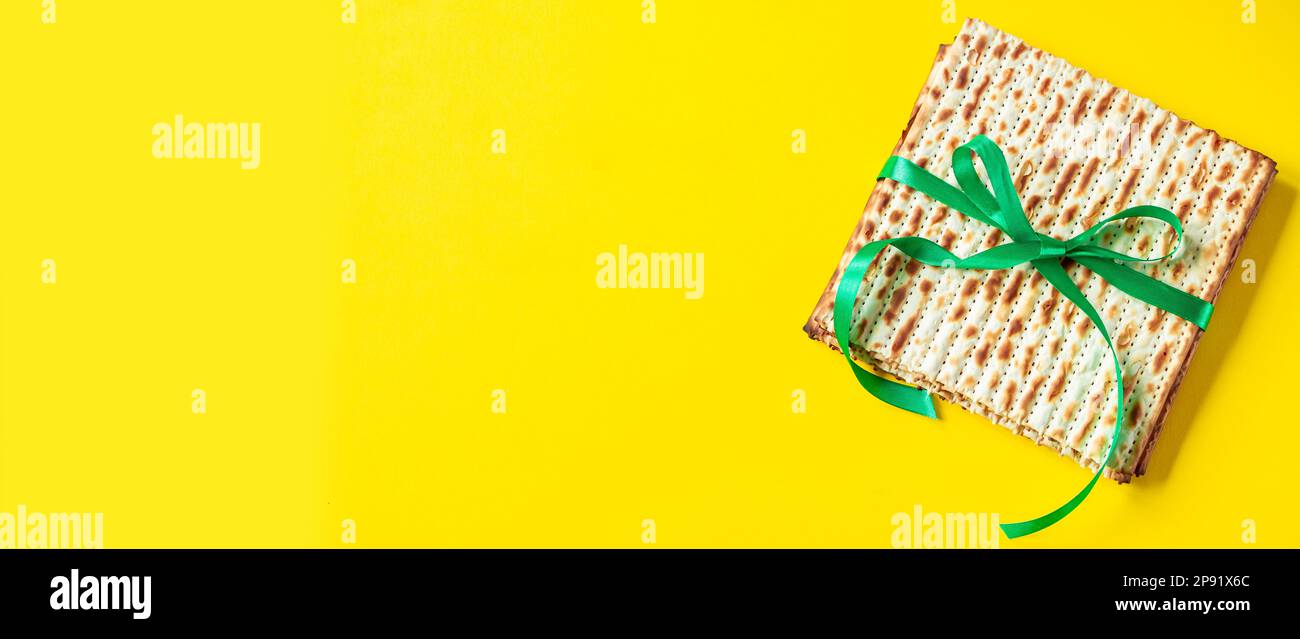 Happy Passover banner. Traditional bread matzo on yellow background ...