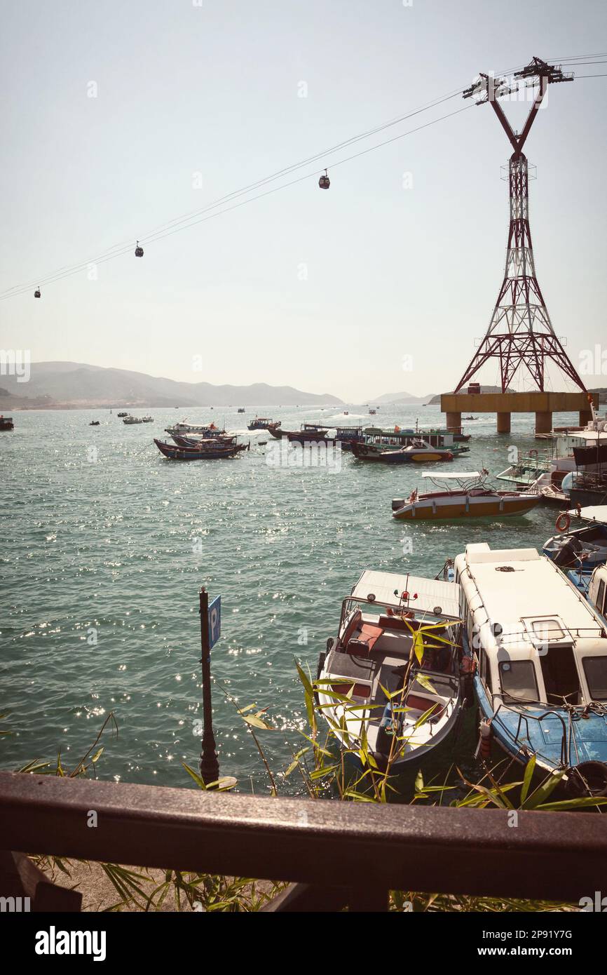 Many vessels at an Asian sea port. Various types of transport - boats ...