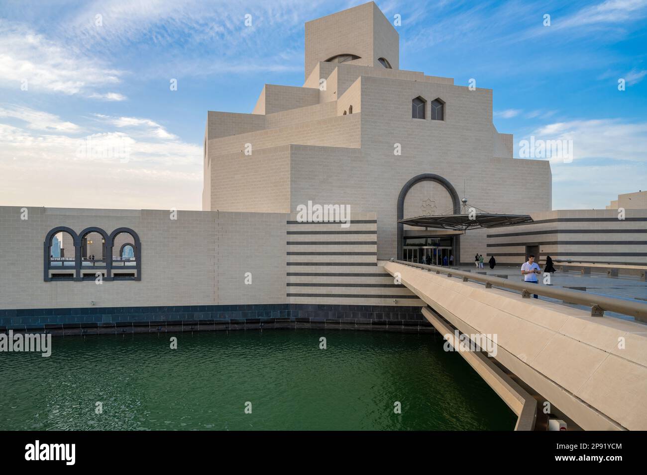 Museum of Islamic Art in daylight exterior view with fountain in ...