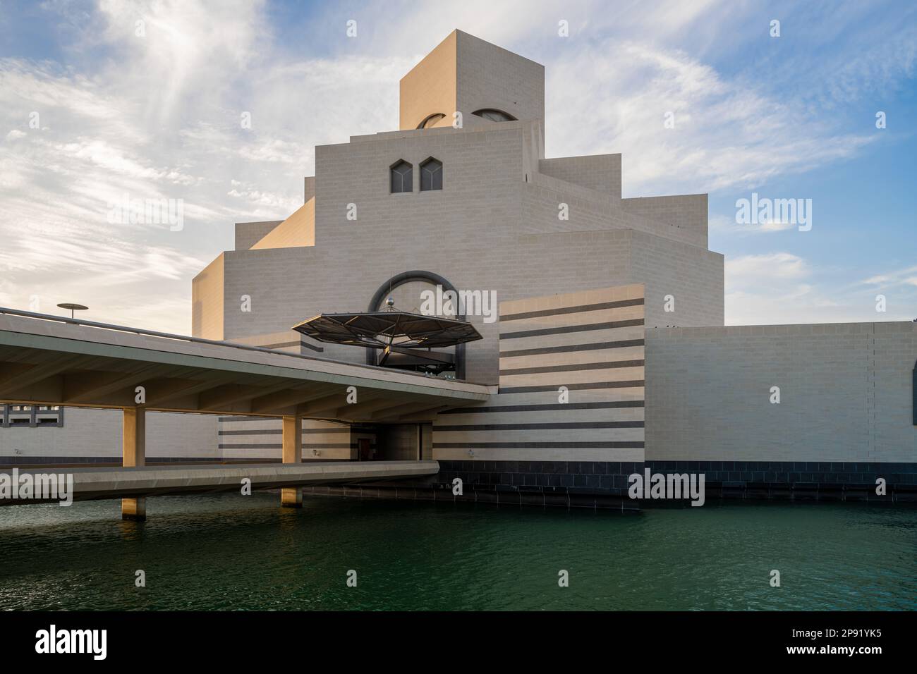 Museum of Islamic Art in daylight exterior view with fountain in ...