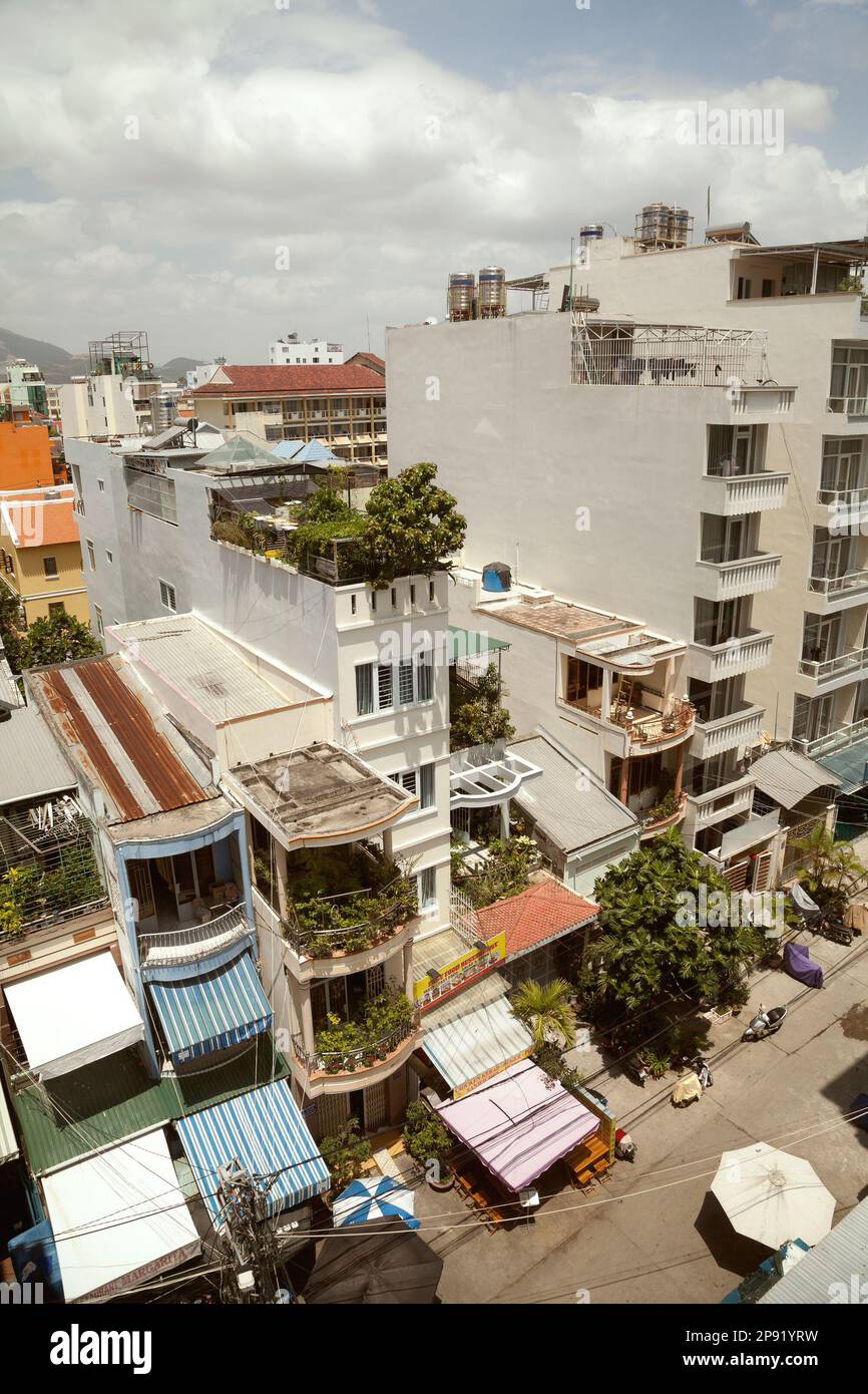 Asian town buildings and a road cityscape top view. Tranquil sunny ...