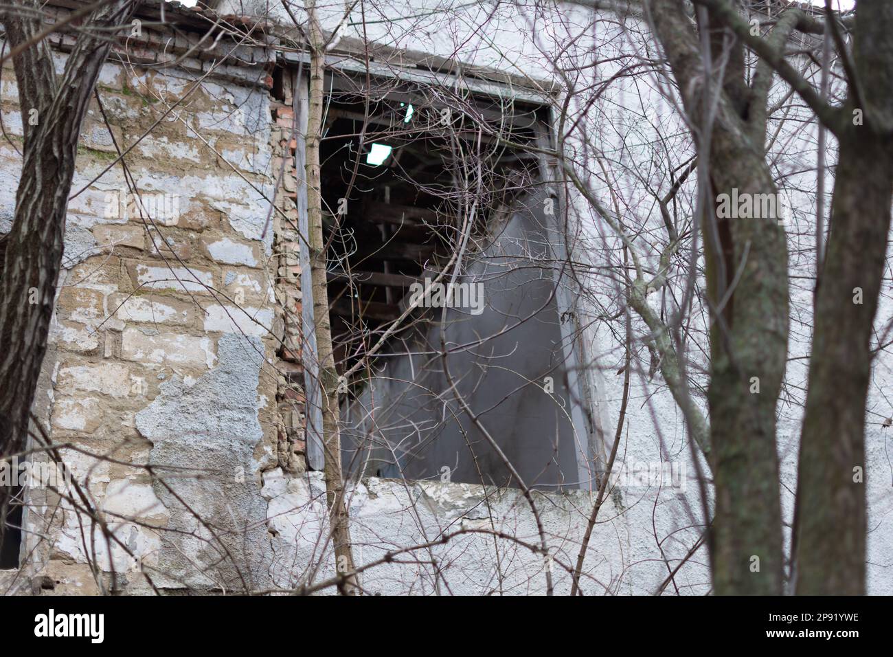 Broken window glass. Window in old abandoned house with broken glass ...