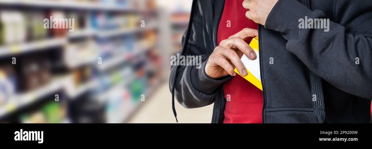 Retail Shoplifting Man Stealing In Supermarket Theft At Shop Stock