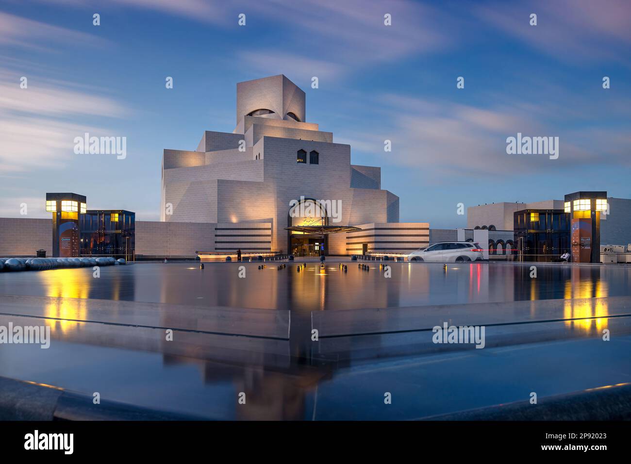 Museum of Islamic Art in daylight exterior view with fountain in ...