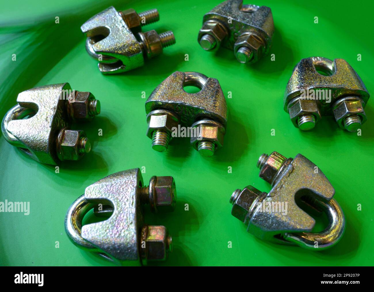 Clamps for cables placed on a stand Stock Photo - Alamy