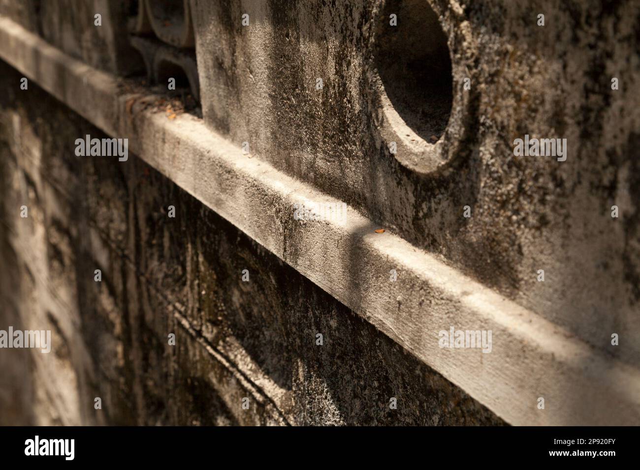 Grey rough dirty wall with drain holes. Geometric textured background ...