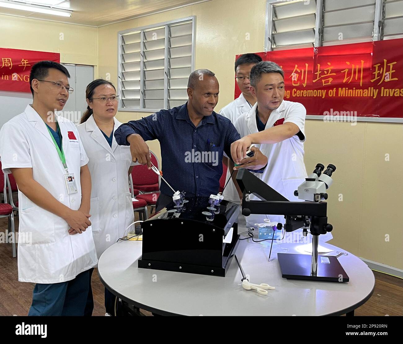 PORT MORESBY, March 10, 2023 (Xinhua) -- Doctors of the 12th Chinese ...
