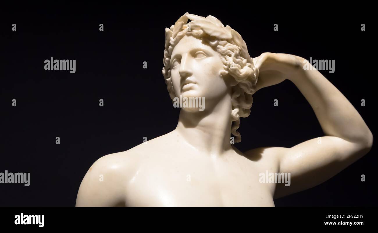 MILAN, ITALY - June 2020: the ancient sculpture Apollo Crowing Himself ...