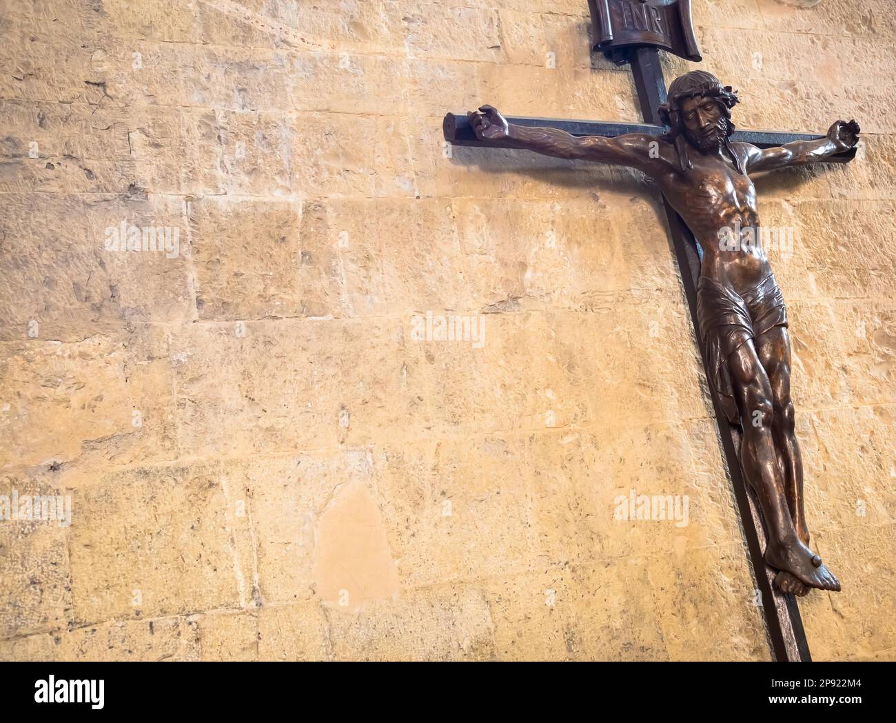 Old Italian crucifix, made of wood, with Jesus Christ symbol of ...