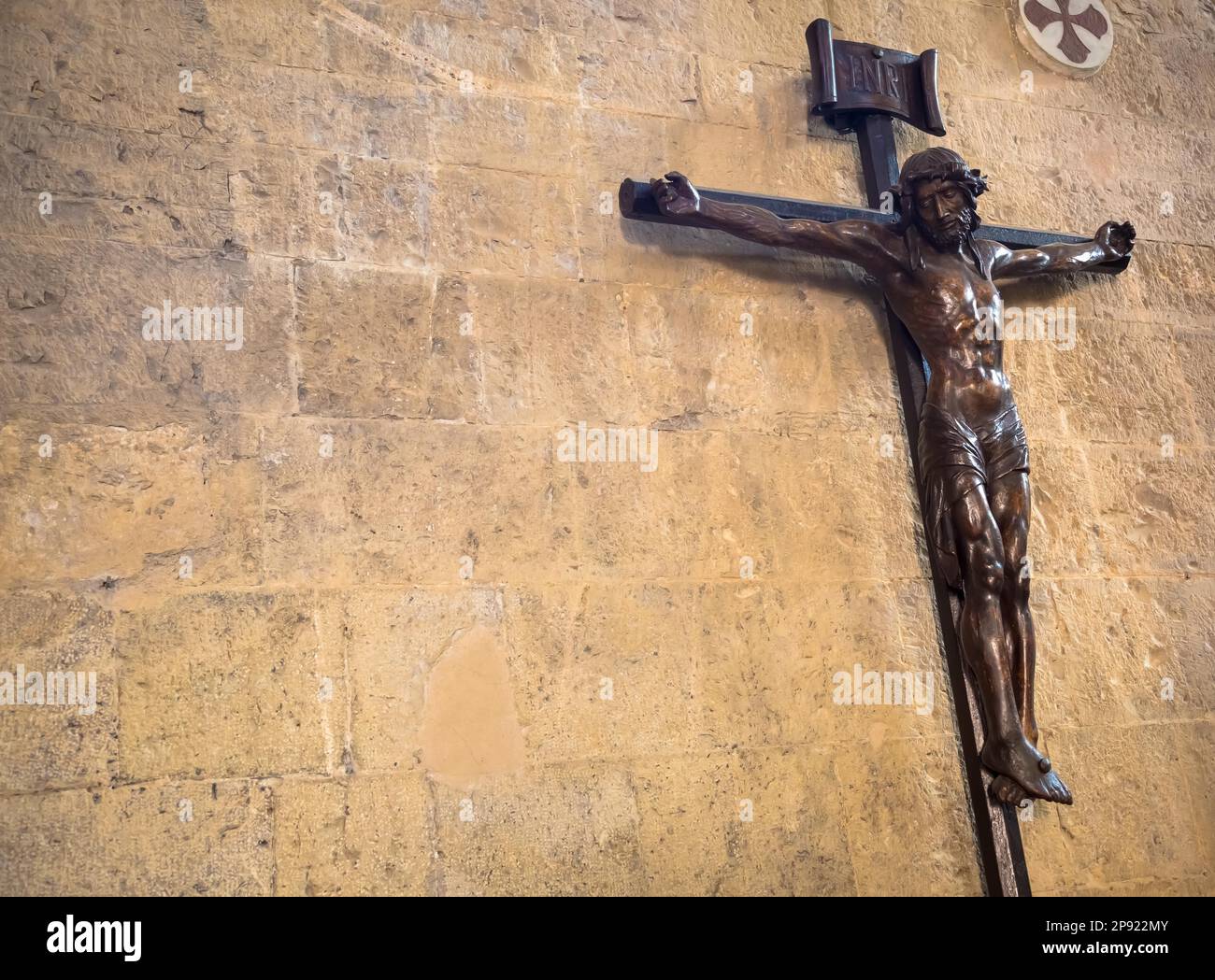 Old Italian crucifix, made of wood, with Jesus Christ symbol of ...