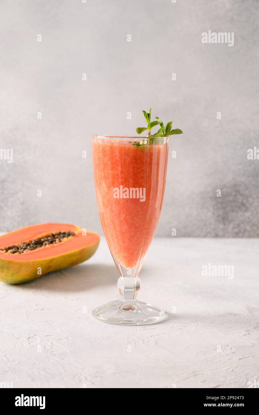 Asian Papaya lassi on gray background. Freshness cold beverage of ...