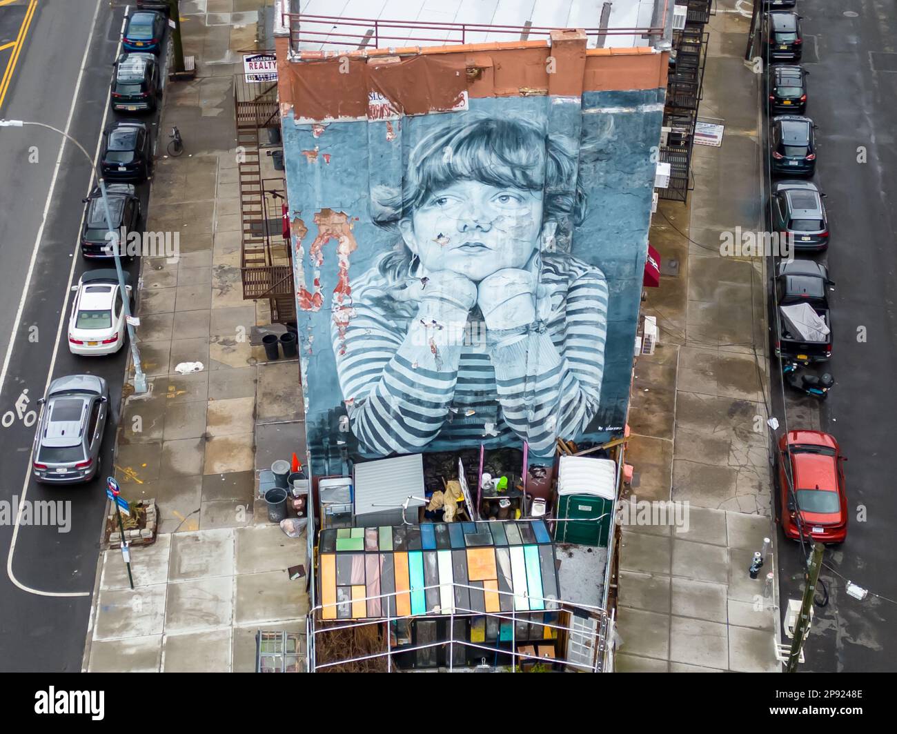 A large mural painting by artist Steven Paul on a building in ...