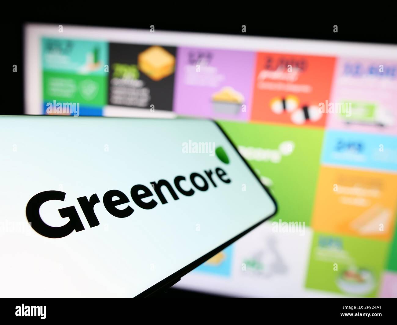 Mobile phone with logo of Irish food company Greencore Group plc on ...