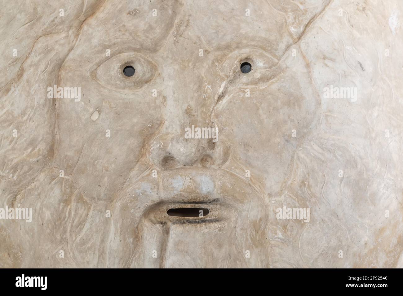 Mouth of truth sightseeing in Rome, Italy. Historical sculpture made of ...