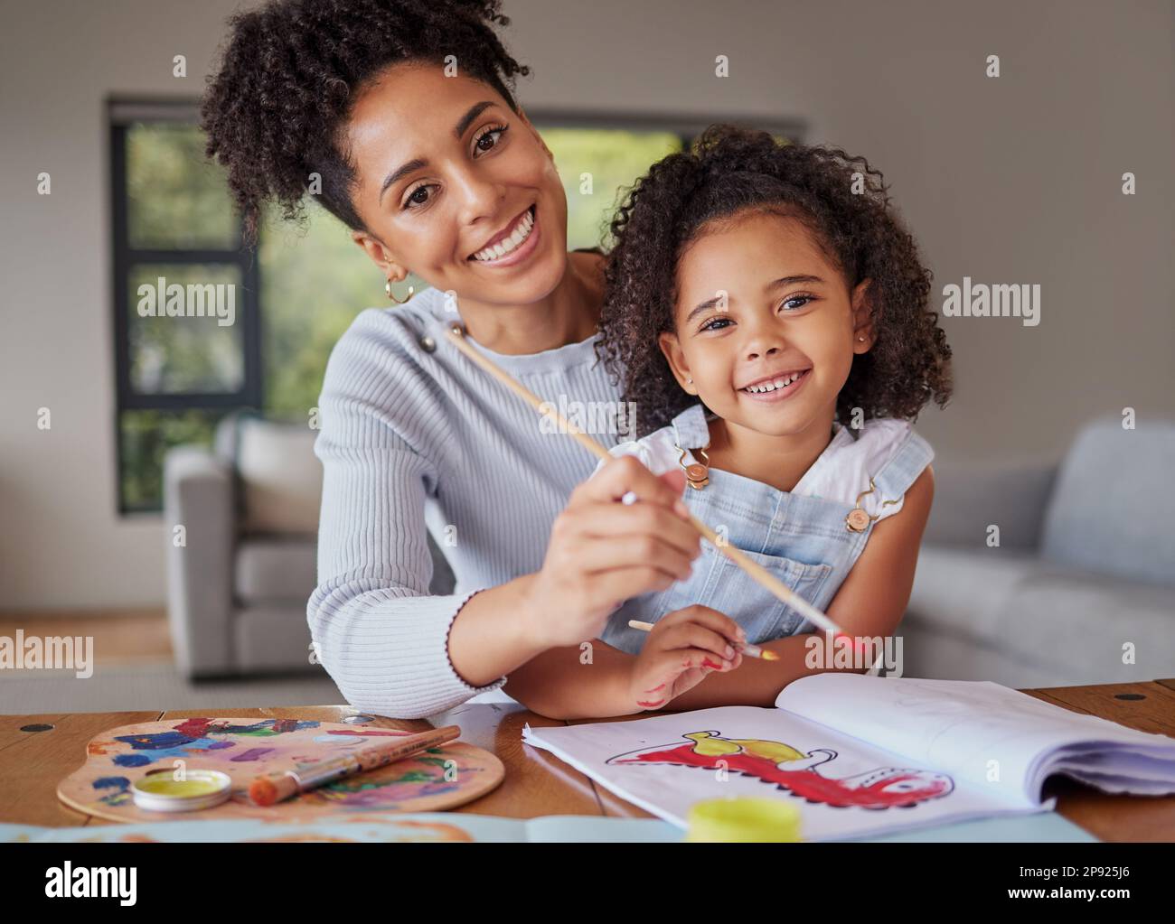 Portrait, mother and girl painting, learning and happy while drawing on ...