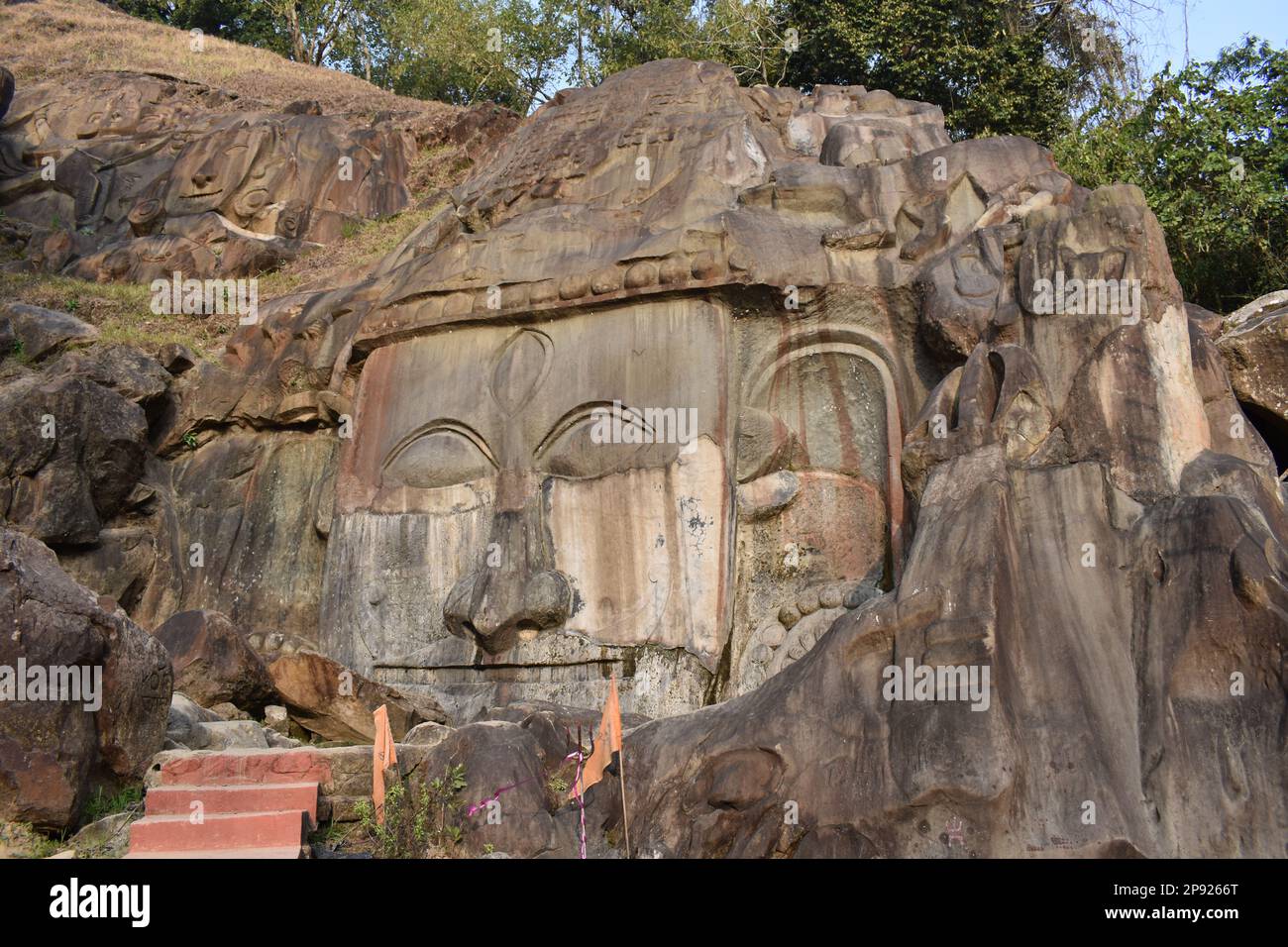 Lord Shiva sculpture carved in a mountain in Unokoti , Tripura , India ...