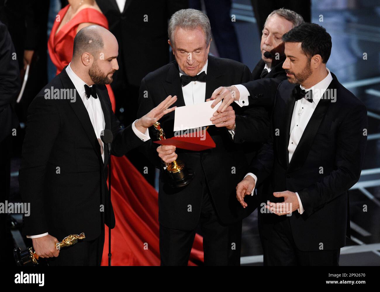 FILE - "La La Land" producer Jordan Horowitz, left, presenter Warren ...