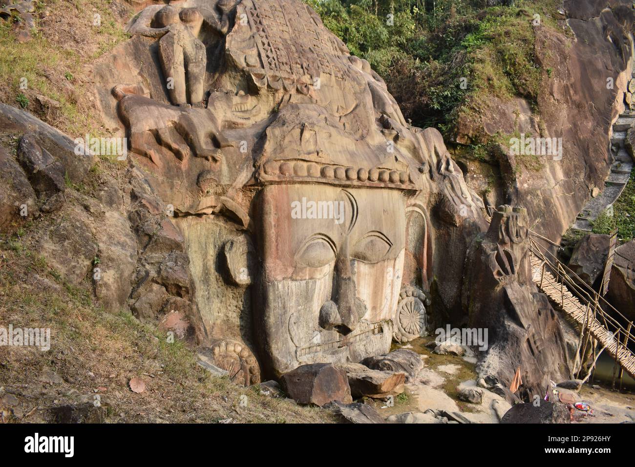 Lord Shiva sculpture carved in a mountain in Unokoti , Tripura , India ...