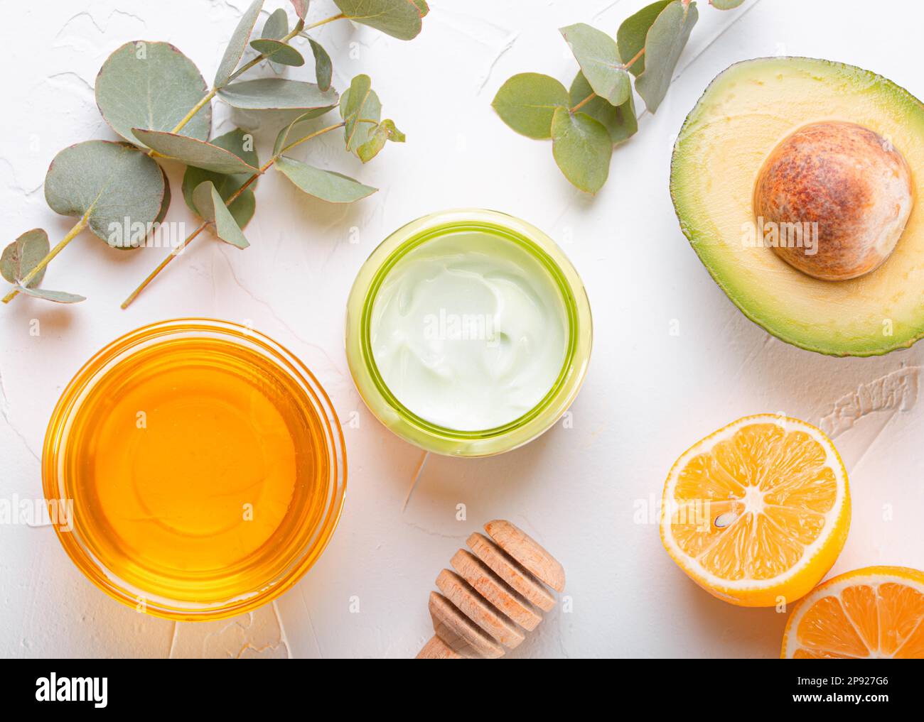 Cosmetic cream with natural organic ingredients avocado, honey, lemon ...