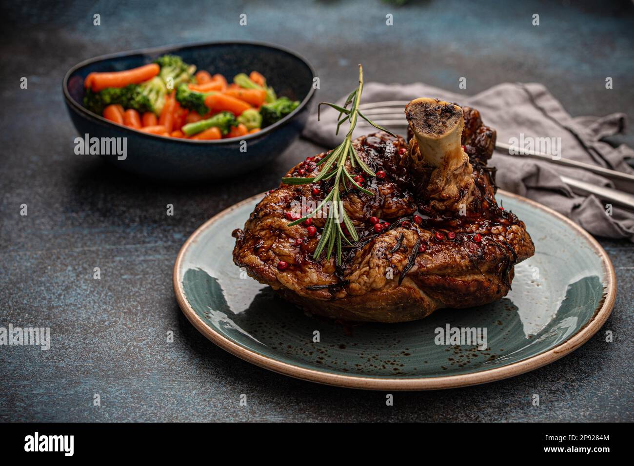 Delicious roasted ham or pork knuckle with glazed brown crispy skin ...