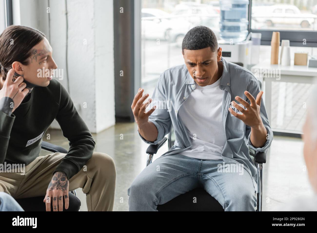 Angry african american man with alcohol addiction sharing problem ...