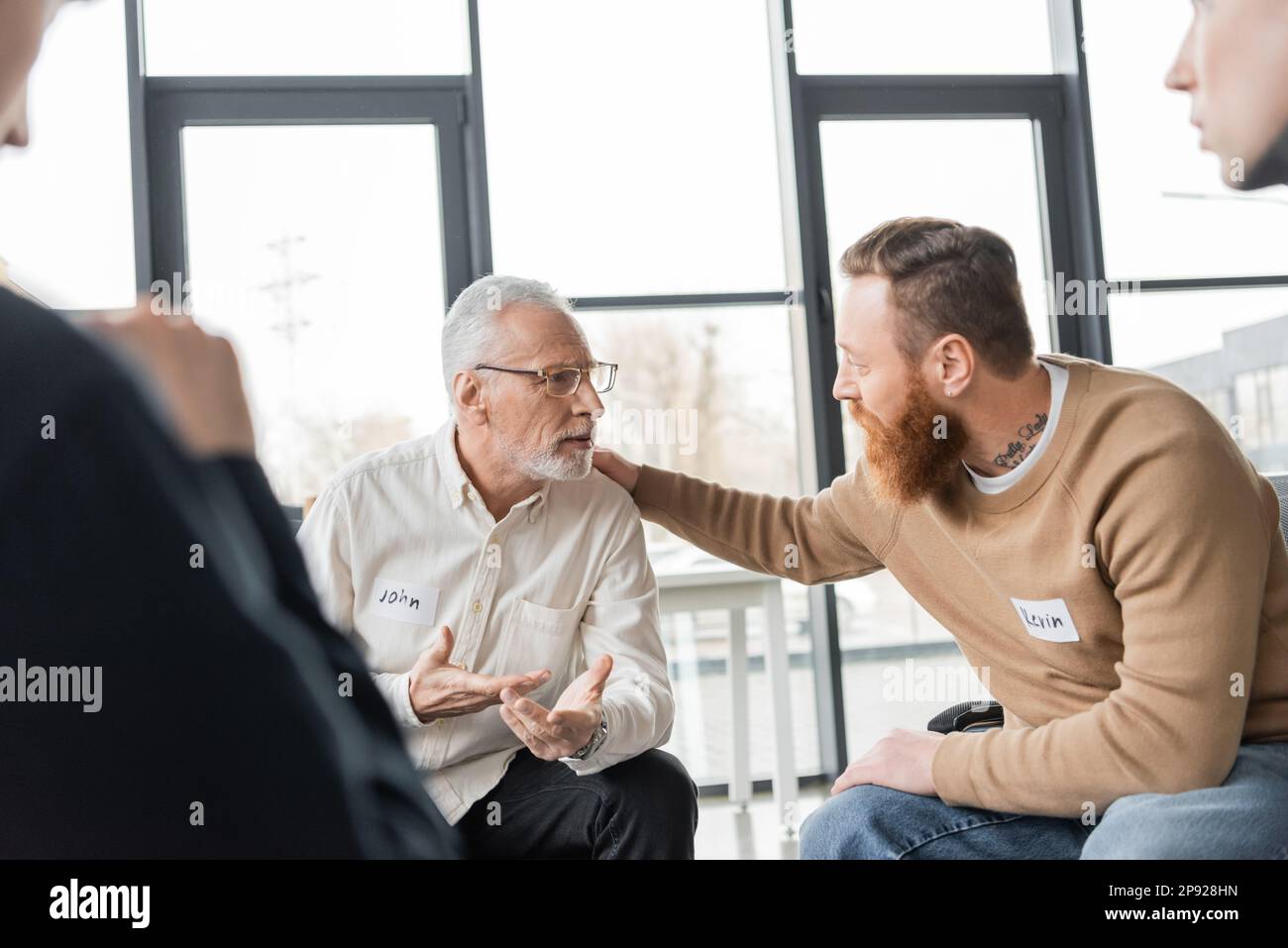 Middle aged man with alcohol addiction sharing problem with group in ...