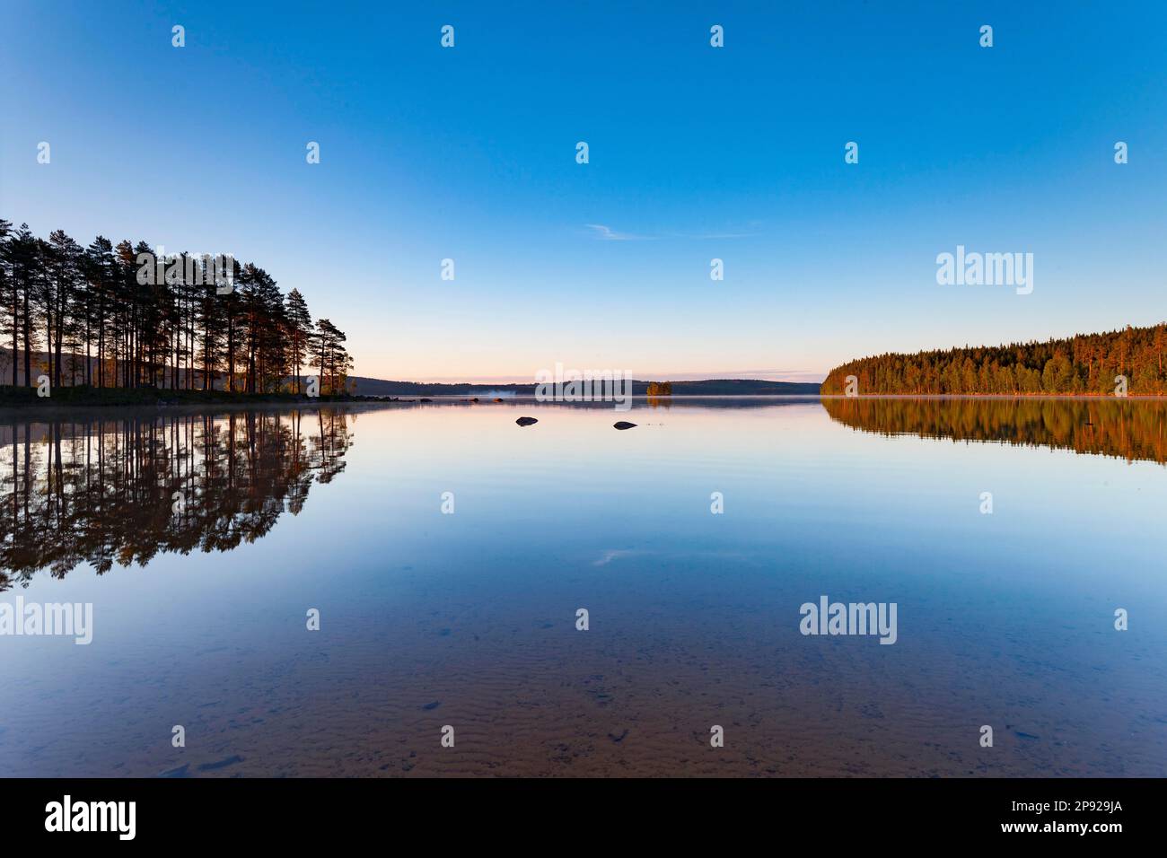 Lake Ransjoen in front of sunrise, Sunne, Vaermland, Sweden Stock Photo ...