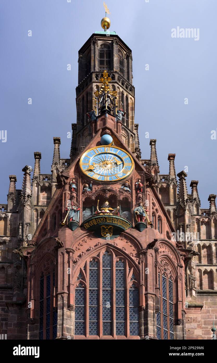 Tower of the Church of Our Lady with clock and the Maennleinlaufen ...
