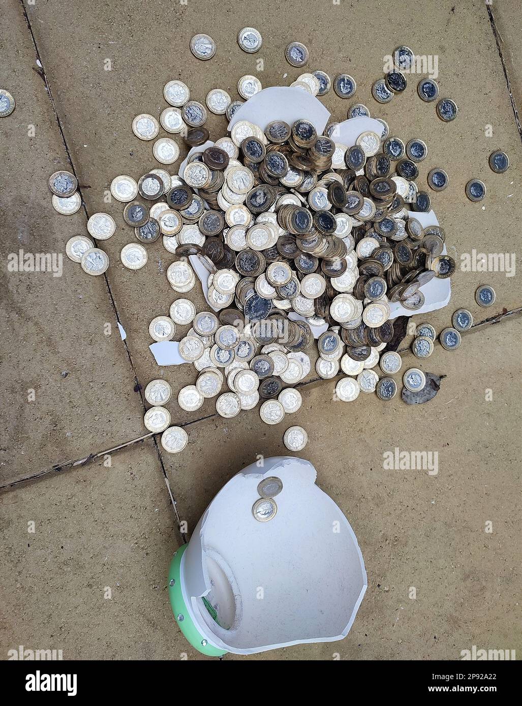 Broken jar of coins hi-res stock photography and images - Alamy