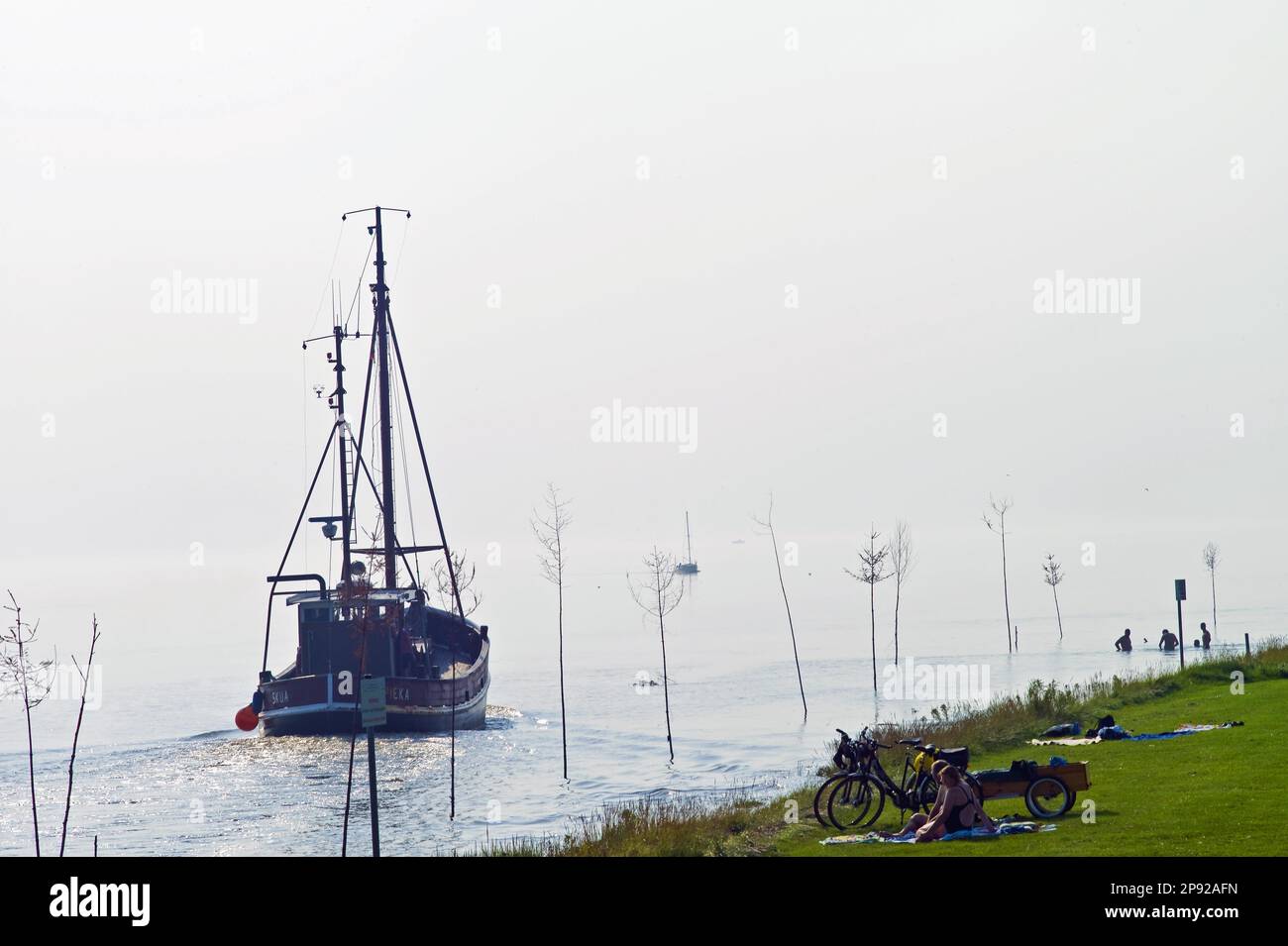 Departing crab cutter, Spieka Neufeld harbour, Germany Stock Photo - Alamy