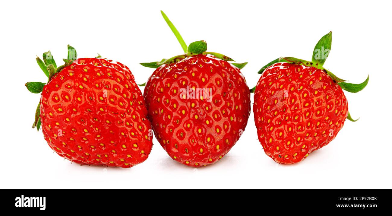 Group of strawberries with leaves isolated on a white background Stock ...