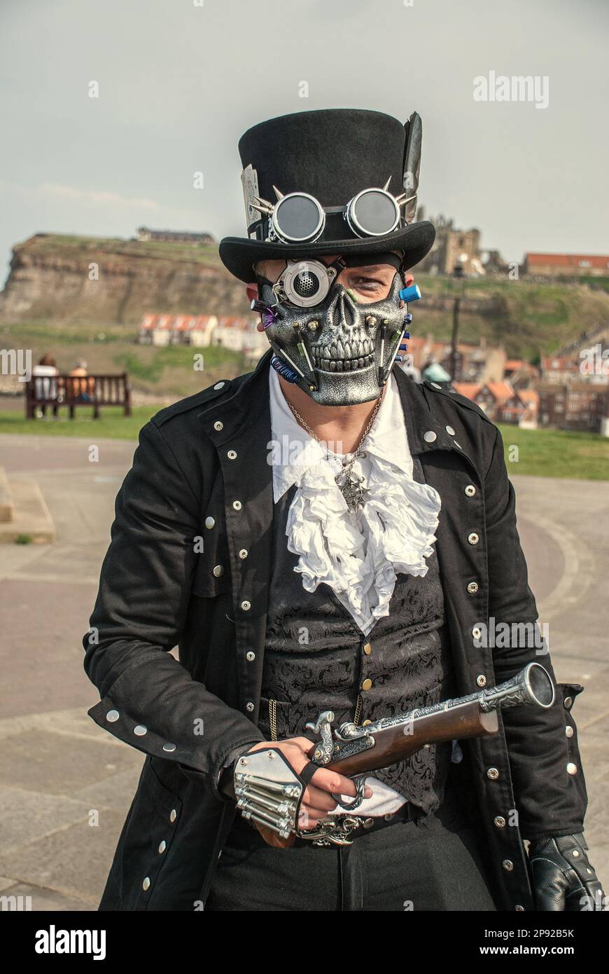 Adorned with weird paraphernalia like metal cogs hi-res stock ...