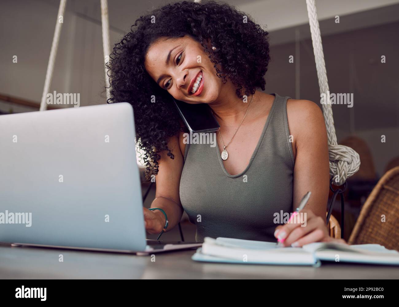 Black woman, phone call and laptop with smile for communication ...