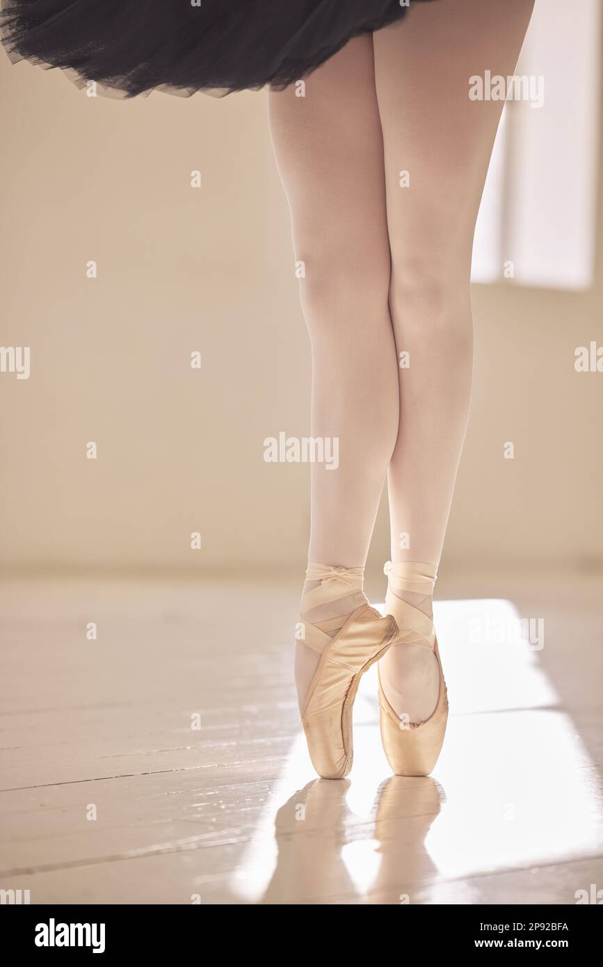 Ballet, feet and shoes of a ballerina or dancer dancing or training for ...