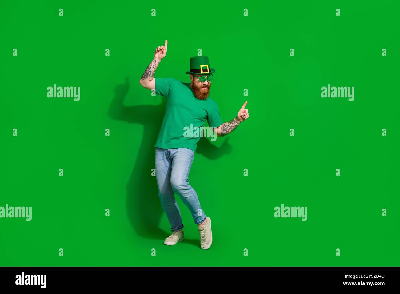 Full length photo of cool excited guy dressed t-shirt cap celebrating ...