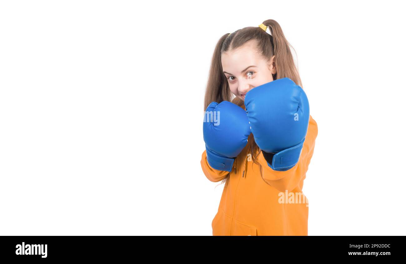 she is ready. teen girl in boxing gloves. angry attack. child boxer on ...